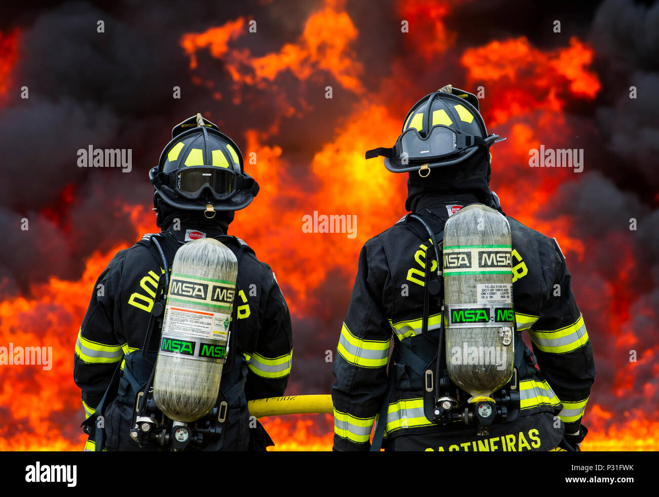 U.S. Air Force firefighters conduct a JP8 fuel fire burn during live ...