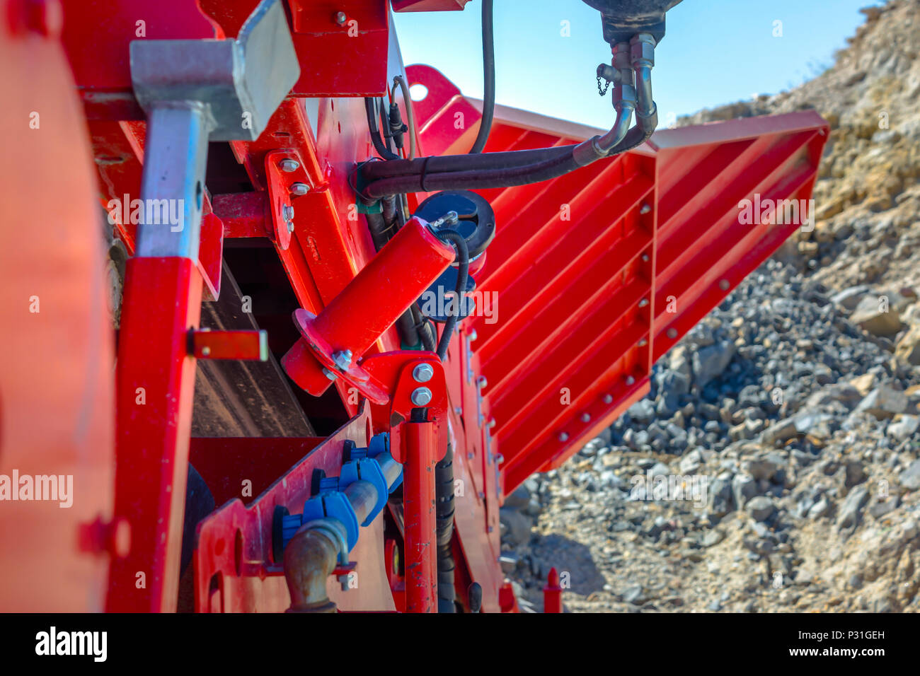 Detail photos of a dump truck at an excavation zone in an area of new ...