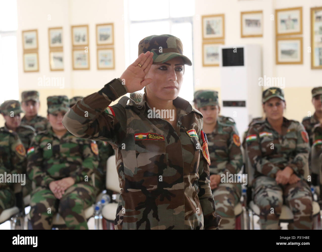 A Zeravani soldier salutes during a graduation ceremony at Bnaslawa ...