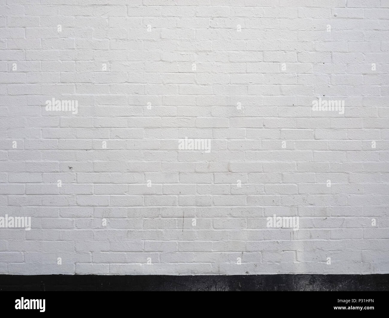 white brick texture useful as a background Stock Photo - Alamy