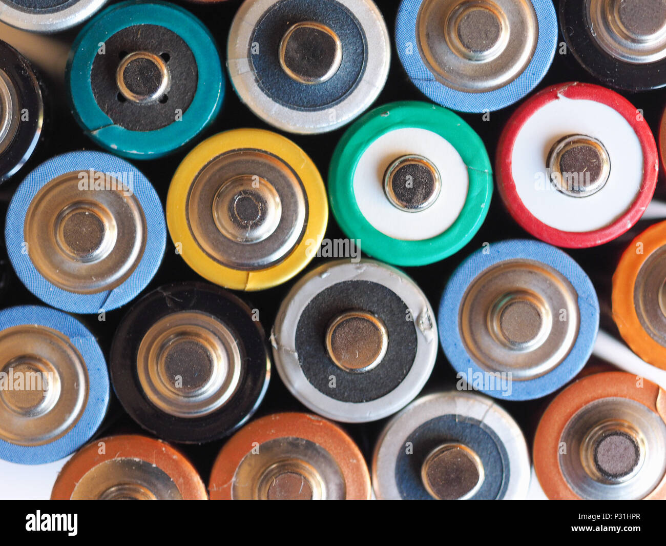 Many AA batteries (aka Double A) for electronic devices Stock Photo - Alamy