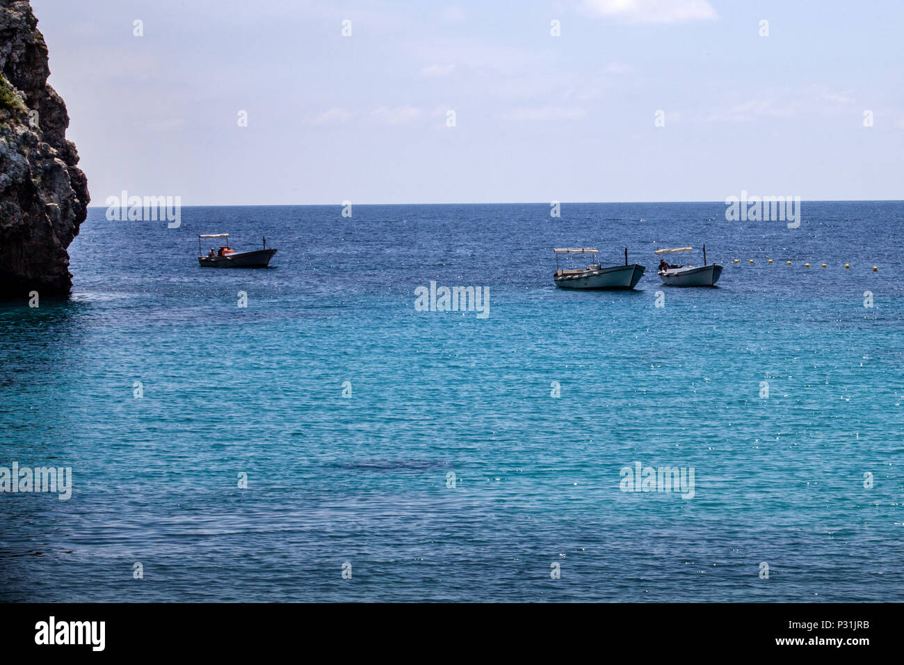Beautiful rock formation islands or islet surrounded with stunning blue ...