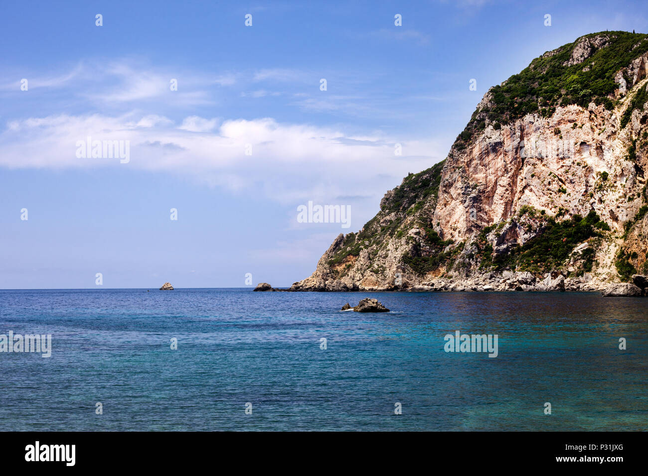 Beautiful rock formation islands or islet surrounded with stunning blue ...