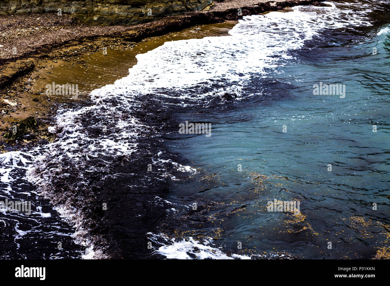 Amazing crystal clear beach blue water of ocean. Big tidal waves ...