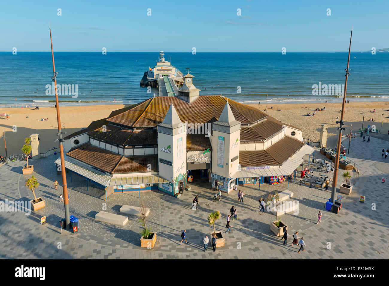 An aerial view of Bournemouth pier and beach with a clear blue sky ...
