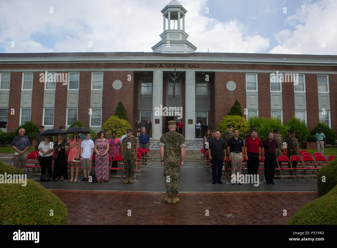 U.S. Marine Corps Maj. Timothy Teed, center, reserve program manager ...