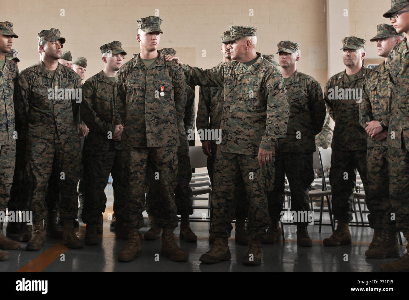 Commandant of the Marine Corps Gen. Robert B. Neller, right, speaks to ...