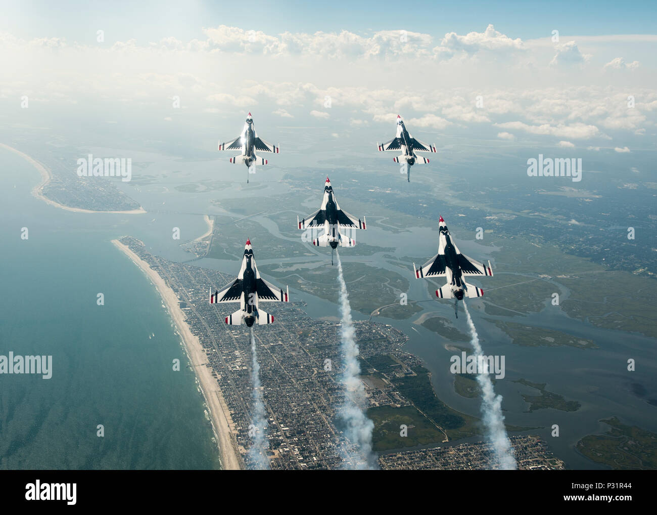 Thunderbirds pilots perform the Five Card Loop maneuver during the ...