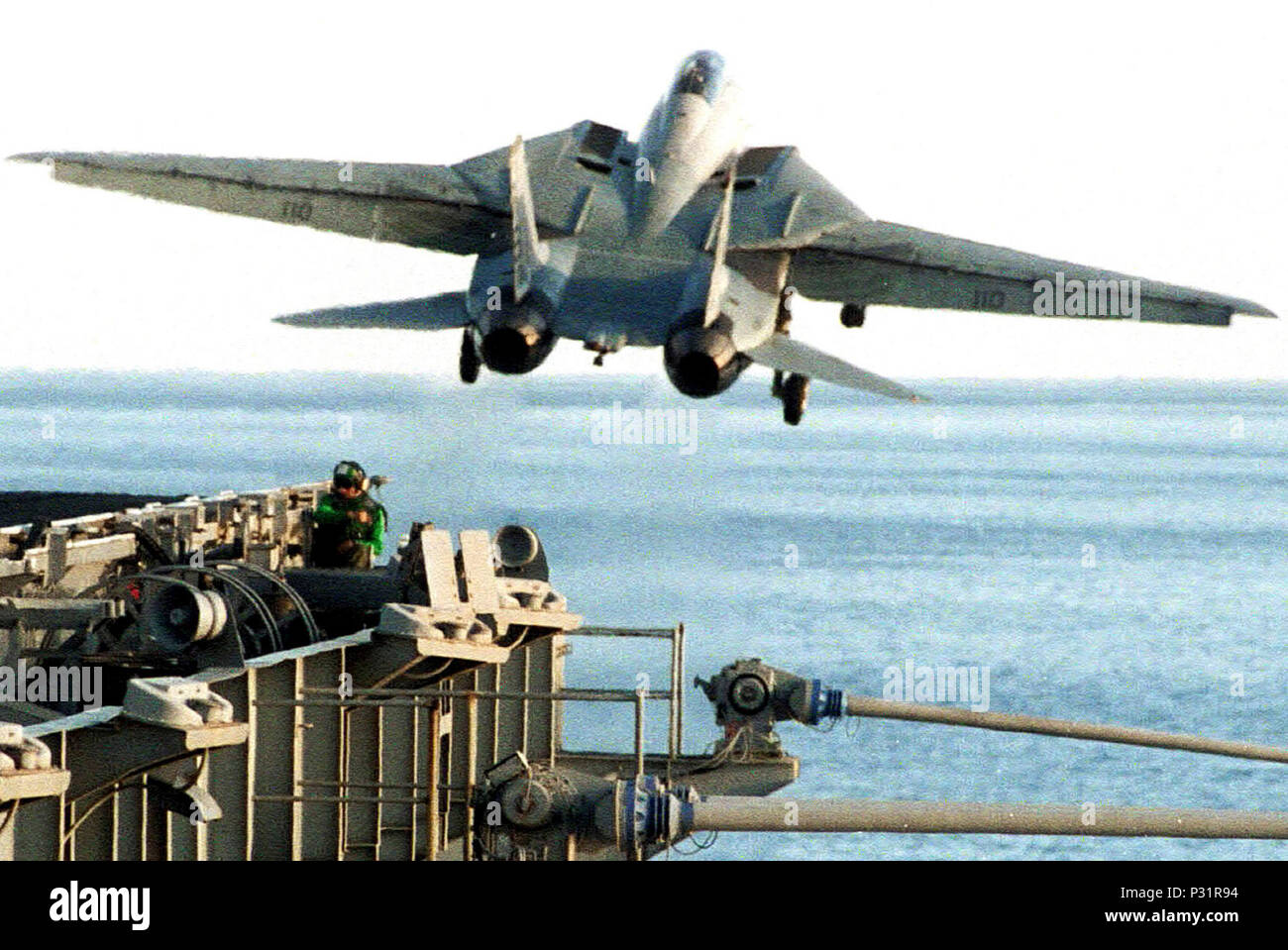 sea aboard USS Theodore Roosevelt (CVN 71) Jan. 2, 2002 - An F-14 ...