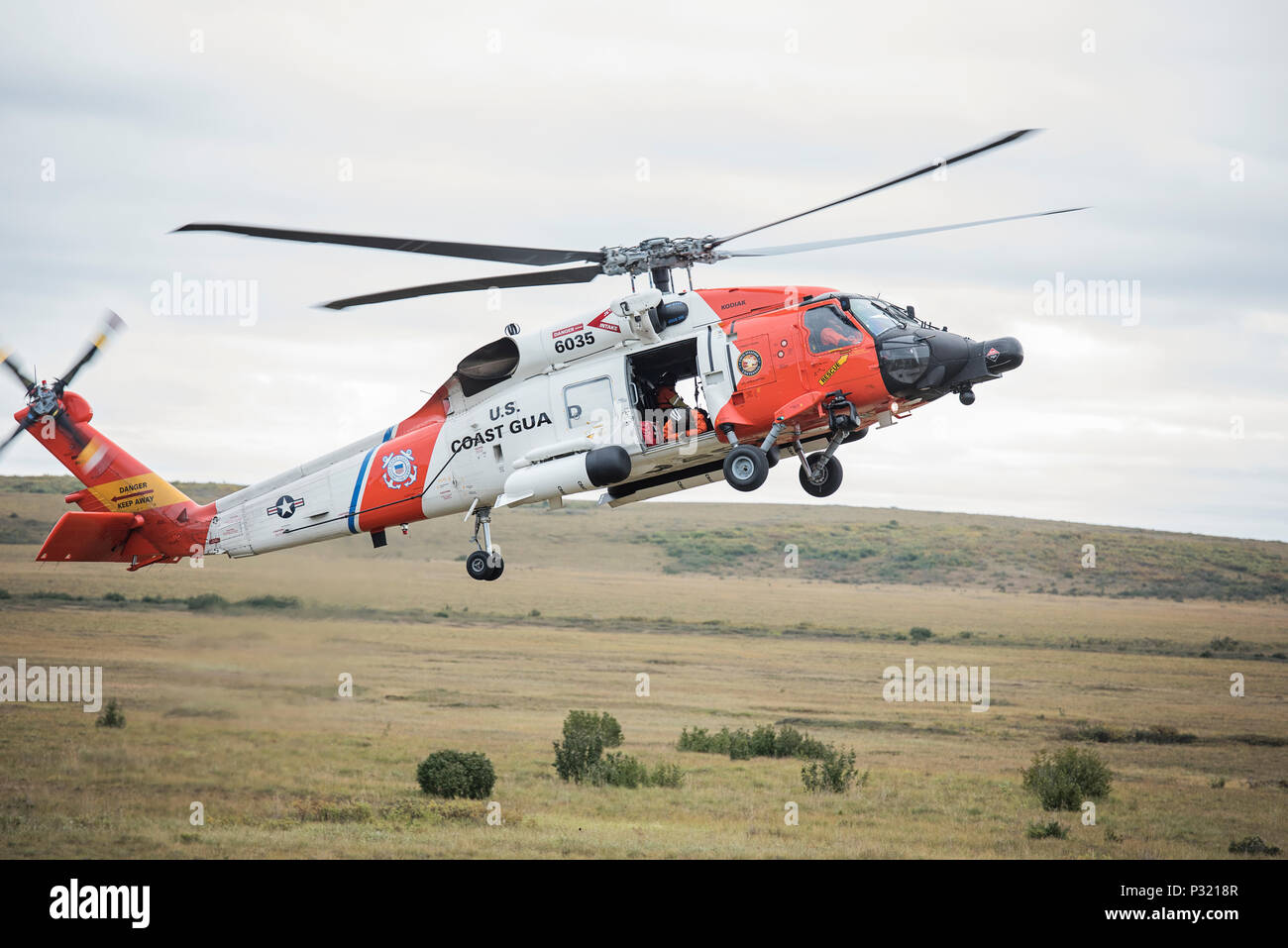 An MH-60 Jayhawk helicopter from U.S. Coast Guard Air Station Kodiak ...