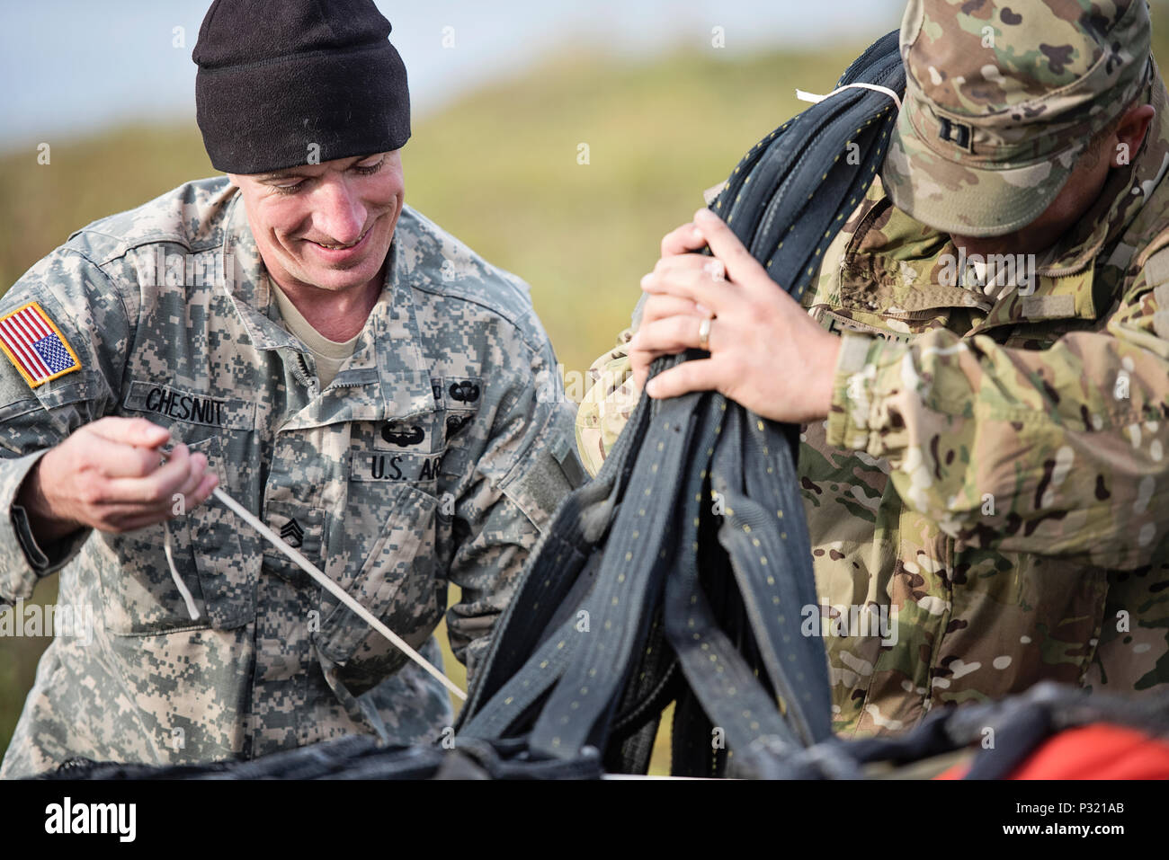 Alaska Army National Guardsmen Capt. Walter Hotch-Hill, and Staff Sgt ...