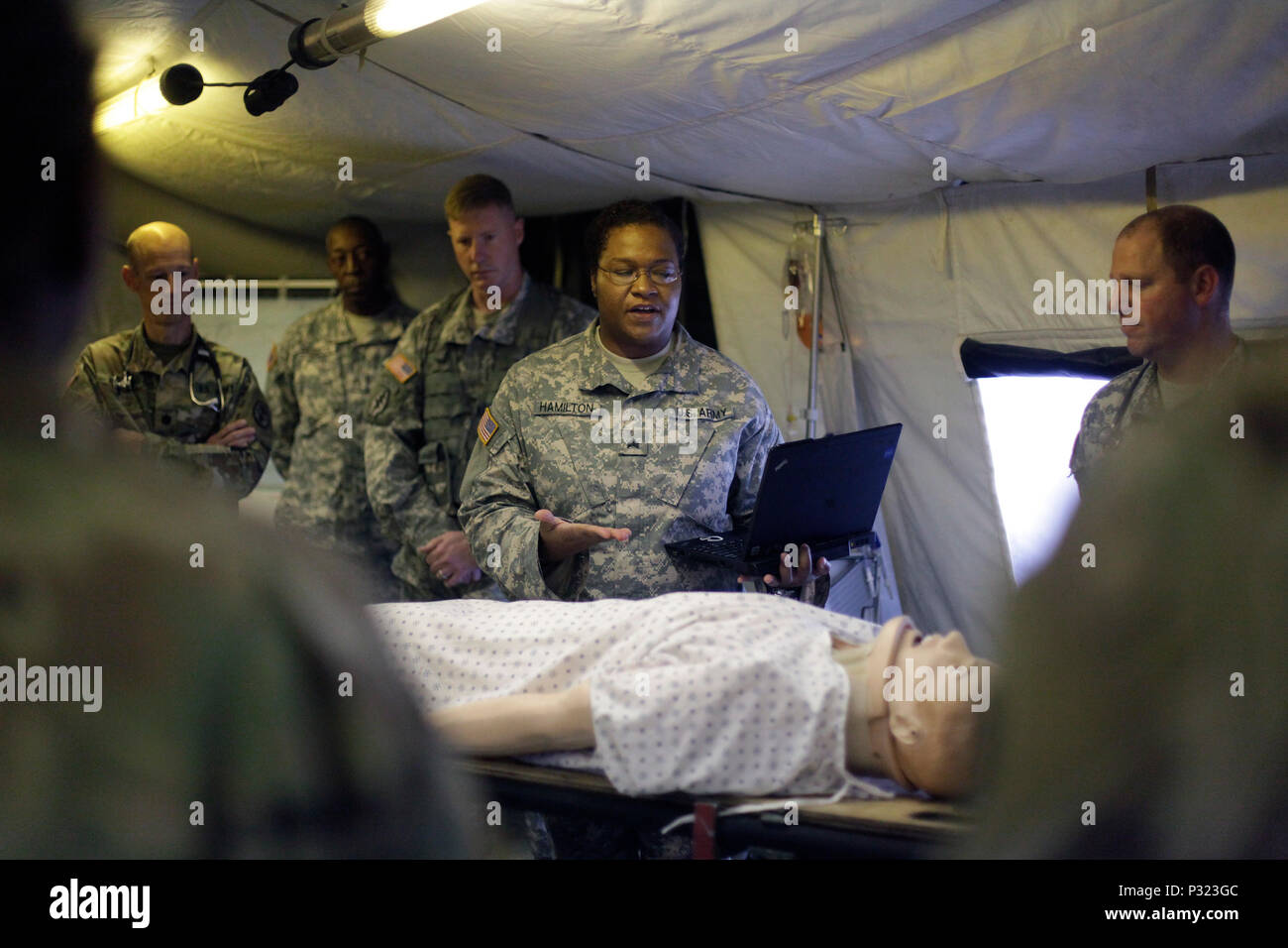A U.S. Army soldier from the 62nd Medical Brigade demonstrates the ...