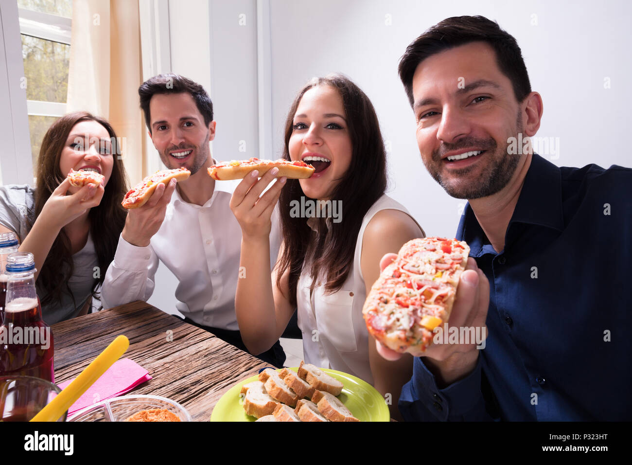 Young man woman enjoying delicious hi-res stock photography and images ...