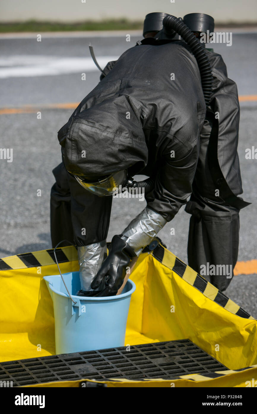U.S. Marines with 1st Marine Aircraft Wing (MAW), Chemical Biological ...