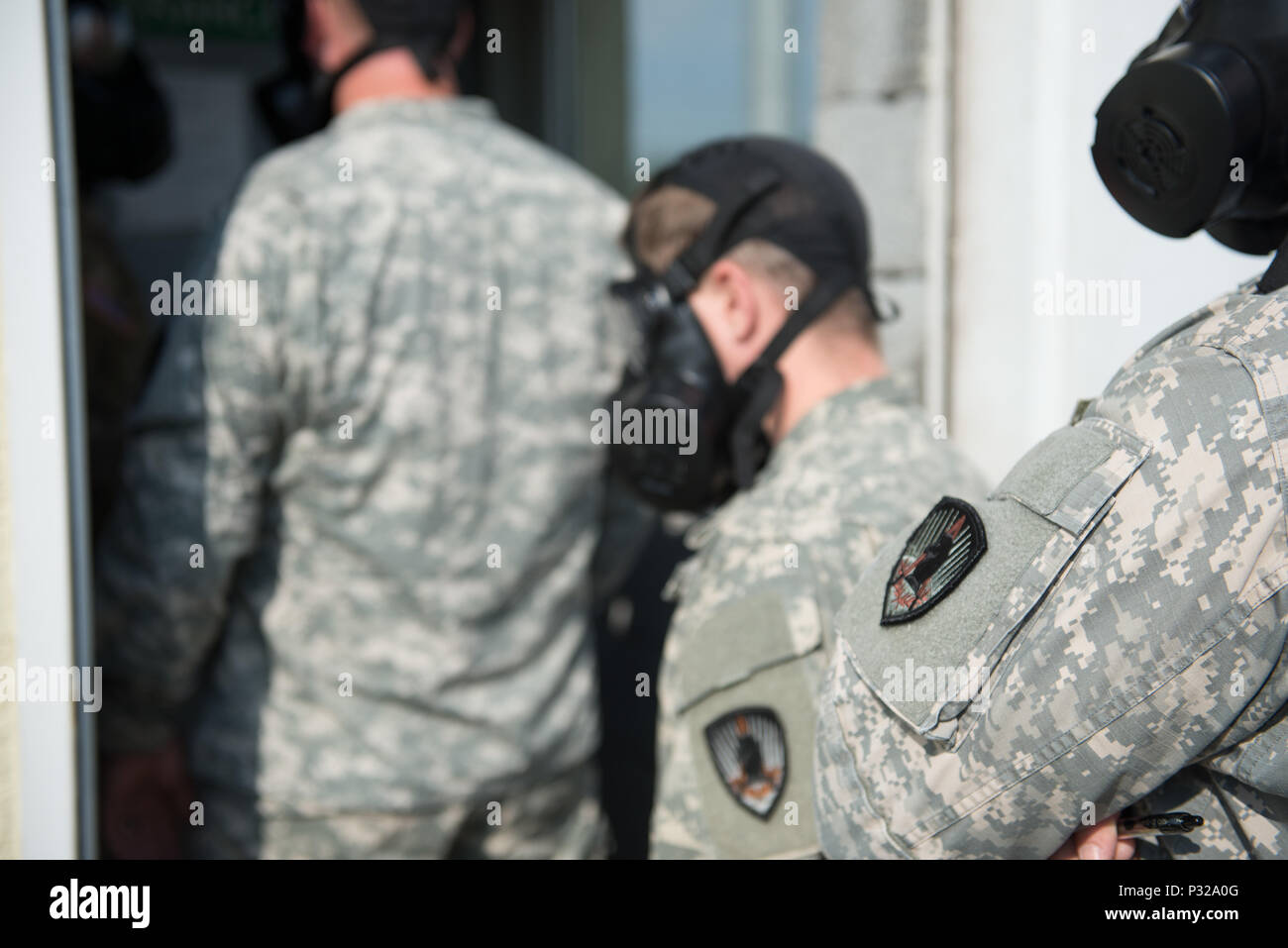 U.S. Soldiers with 650th Military Intelligence Group enter the TSC ...