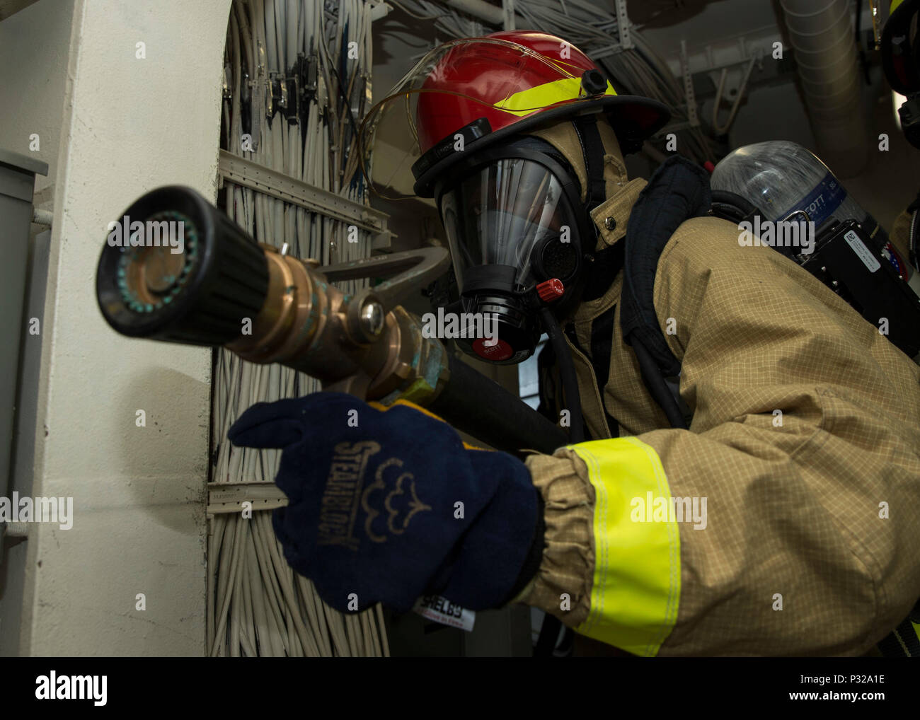 NEWPORT NEWS, Va. (August 24, 2016) -- The hose team nozzleman combats ...