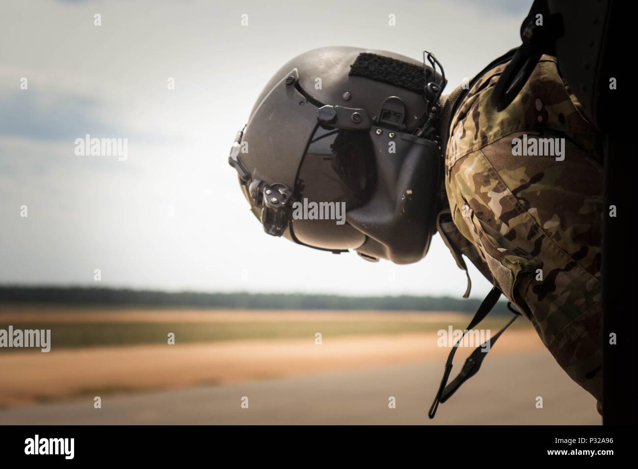 A UH-60 Black Hawk crew chief with the 82nd Combat Aviation Brigade ...
