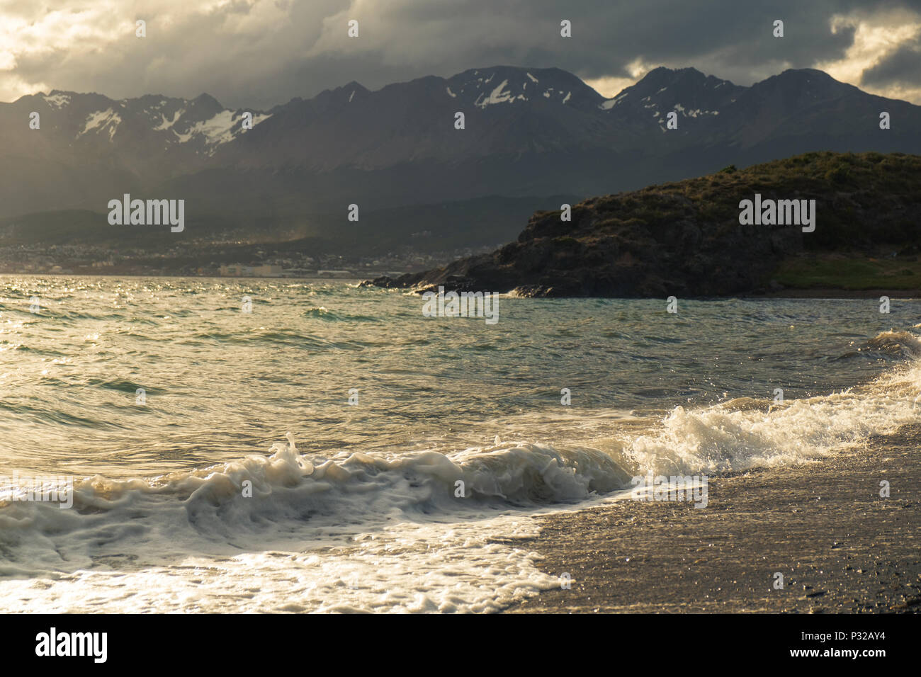 A wave ends on the beach of Playa Larga. In the background you see the ...