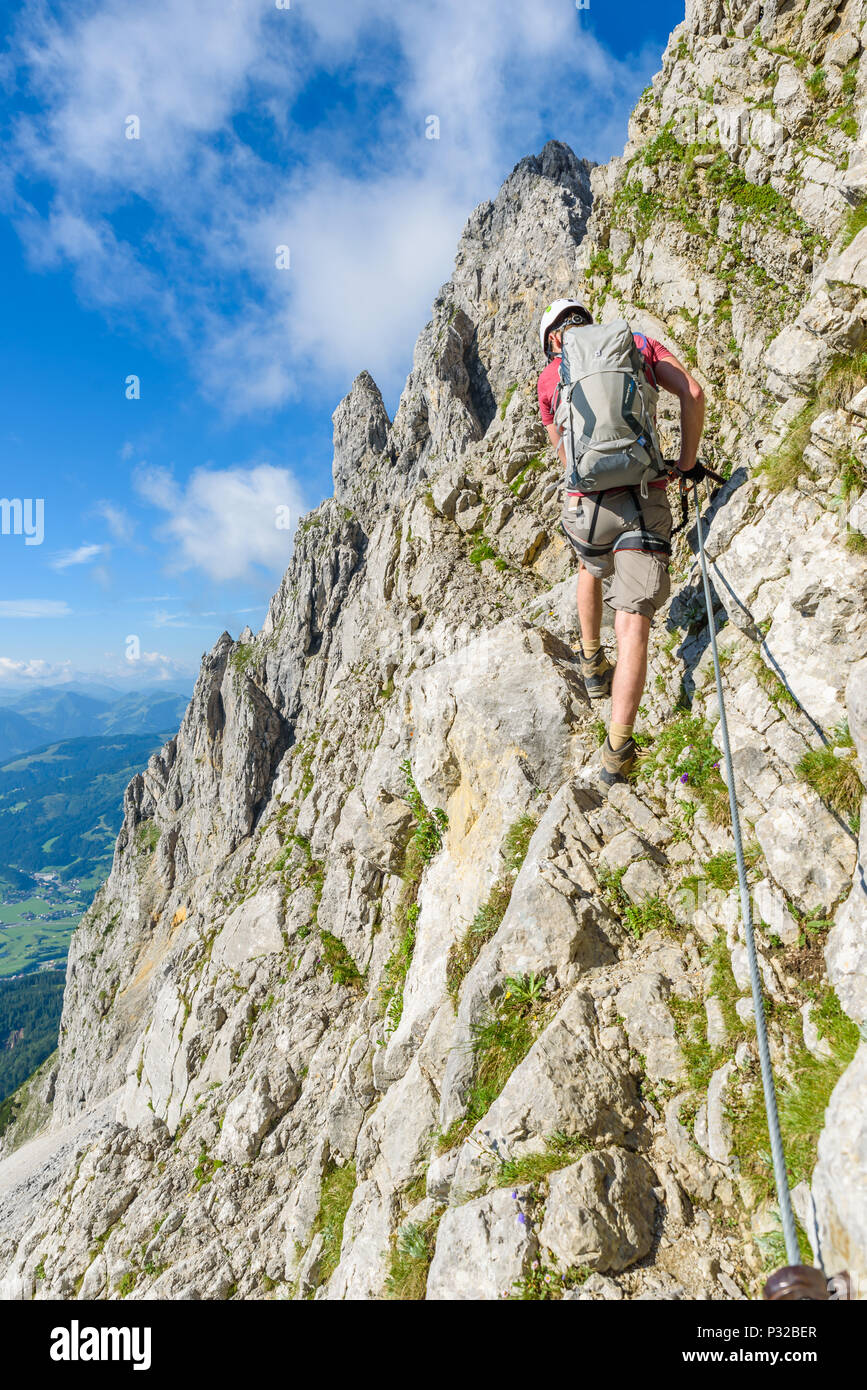Hiker at Ellmauer Halt, Wilder Kaiser mountains of Austria - close to ...