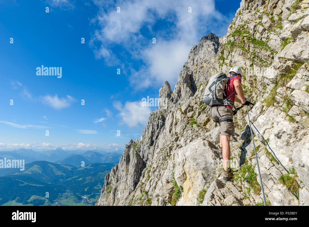 Hiker at Ellmauer Halt, Wilder Kaiser mountains of Austria - close to ...