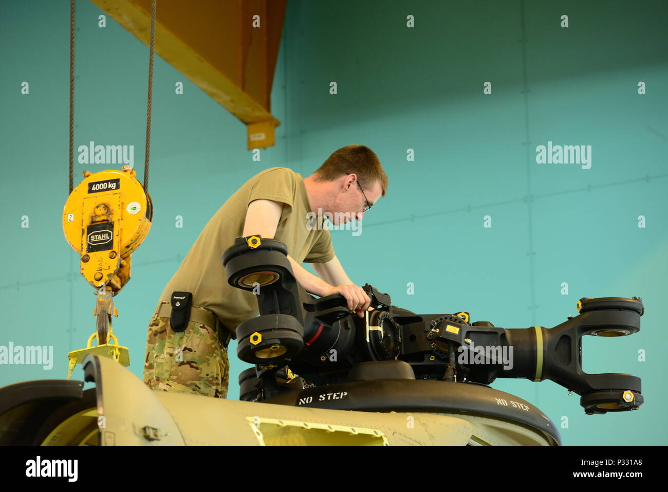 U.S. Army Sgt. Samuel Fielder, a Chinook mechanic with Hotel Company ...