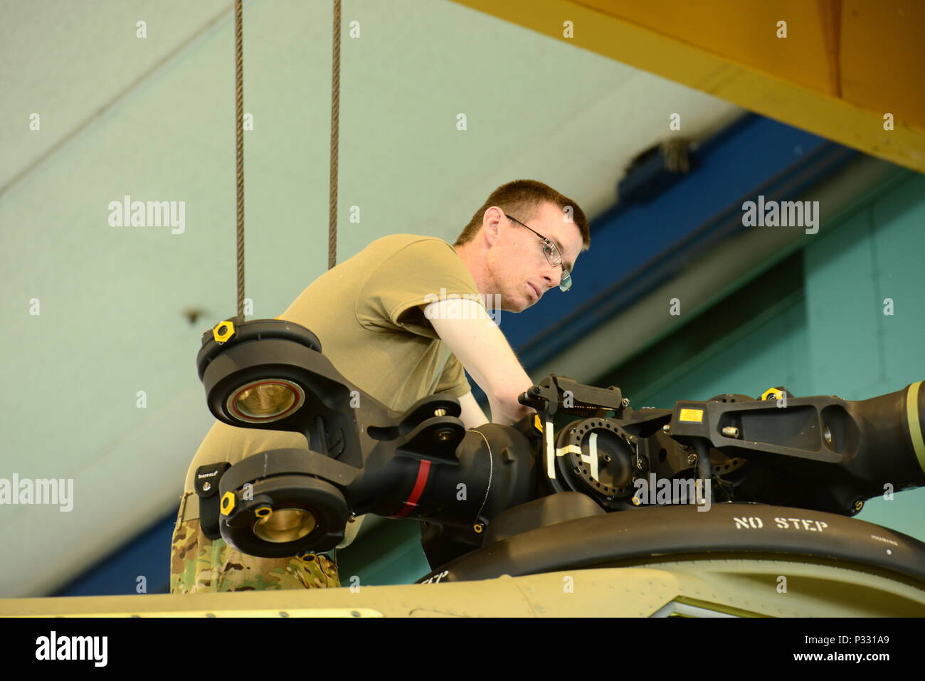 U.S. Army Pfc. Samuel Fielder, a Chinook mechanic with Hotel Company ...