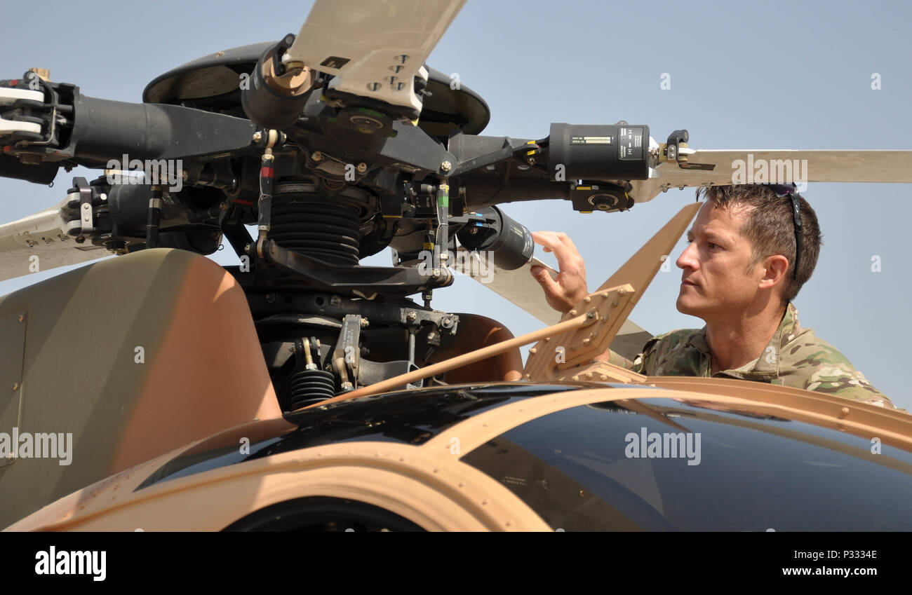 American advisors from Train, Advise, Assist Command-Air (TAAC-Air) flew a three ship MD-530 ...