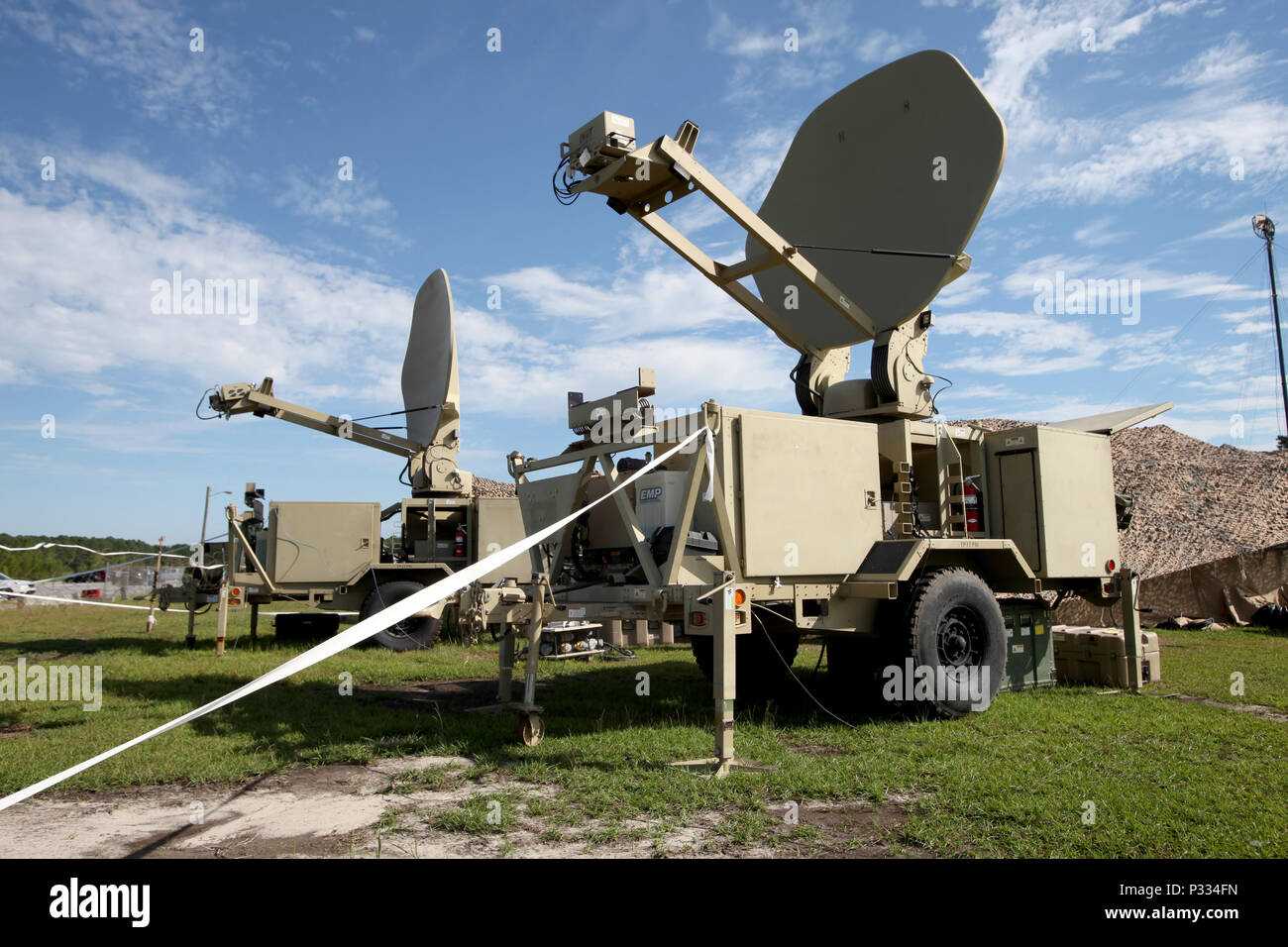 Two Very Small Aperture Terminals (VSAT) Large, are positioned during a ...