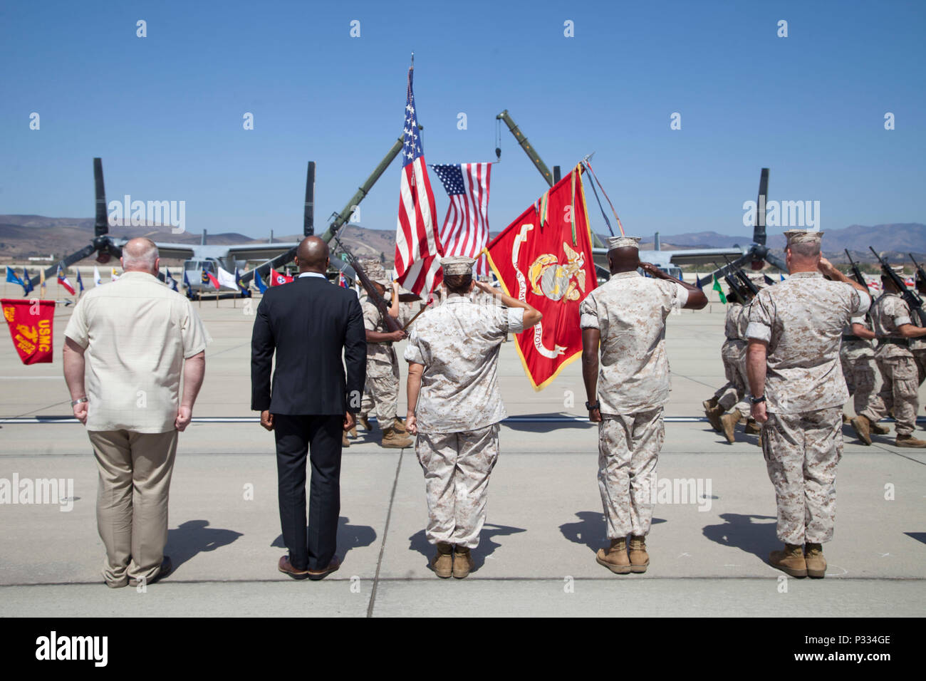 U.S. Marines, active and retired, participate in the pass in review ...