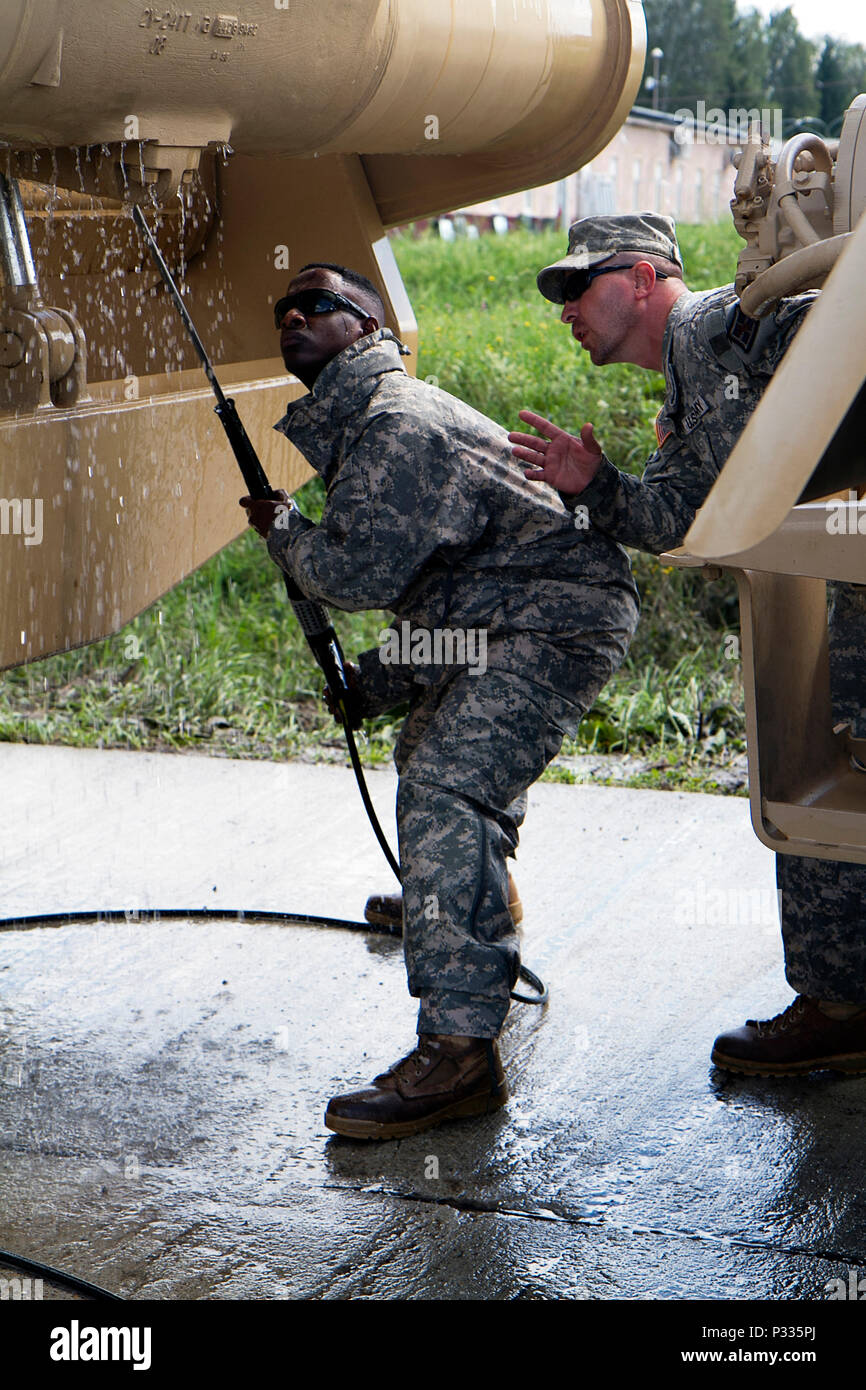 Pvt. Jarius McGhee a Carpentry and Masonry Specialist, 12W, with the ...