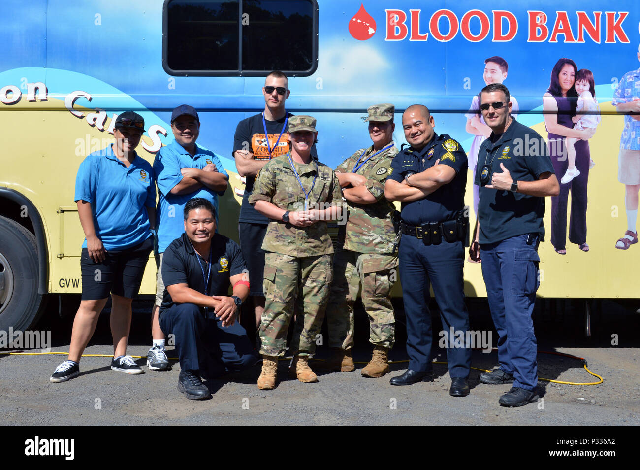 Three Soldiers (center) assigned to the 325th Brigade Support Battalion ...