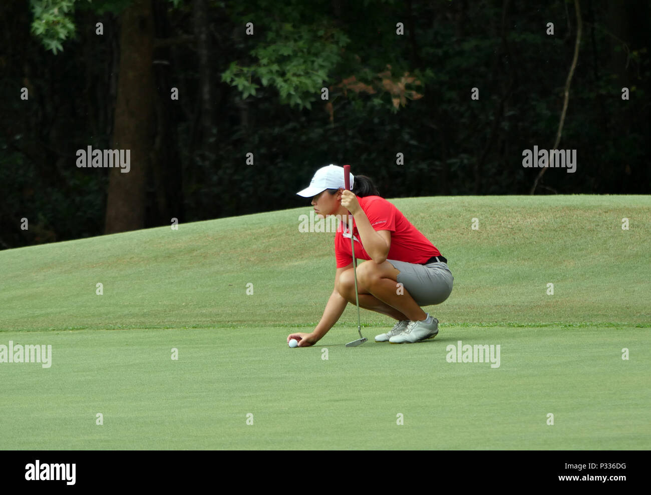 Air Force 1st Lt. Deborah Kim on the green ready to put during the 2016 ...