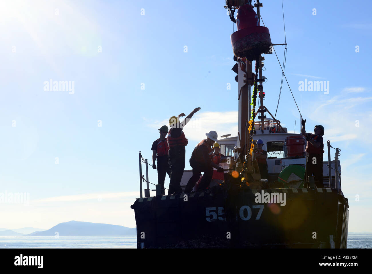 A Coast Guard crew from Aids to Navigation Team Puget Sound, in Seattle ...