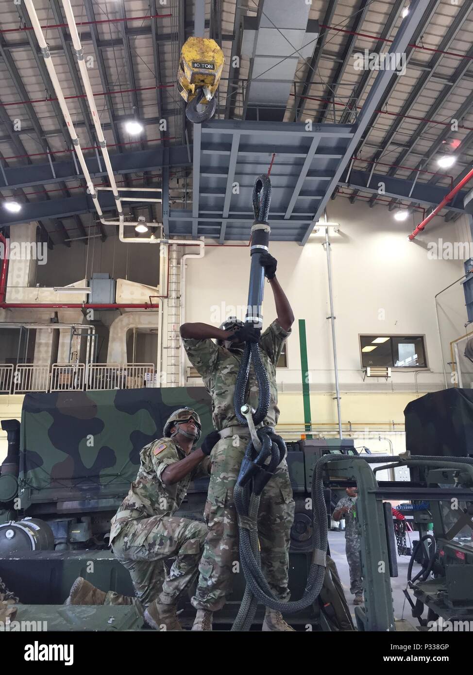 Spc. Gregory Knight and Pfc. Dayne Leonard, Forward Support Company H ...