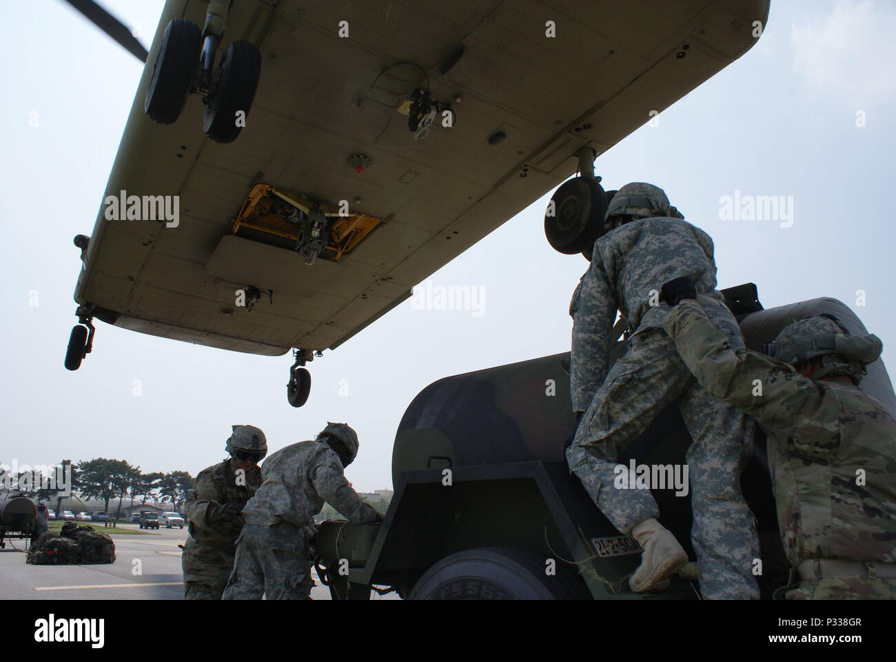 (From left to right) Spc. Kody Quesenberry, Spc. Rasheed Walker, Sgt ...