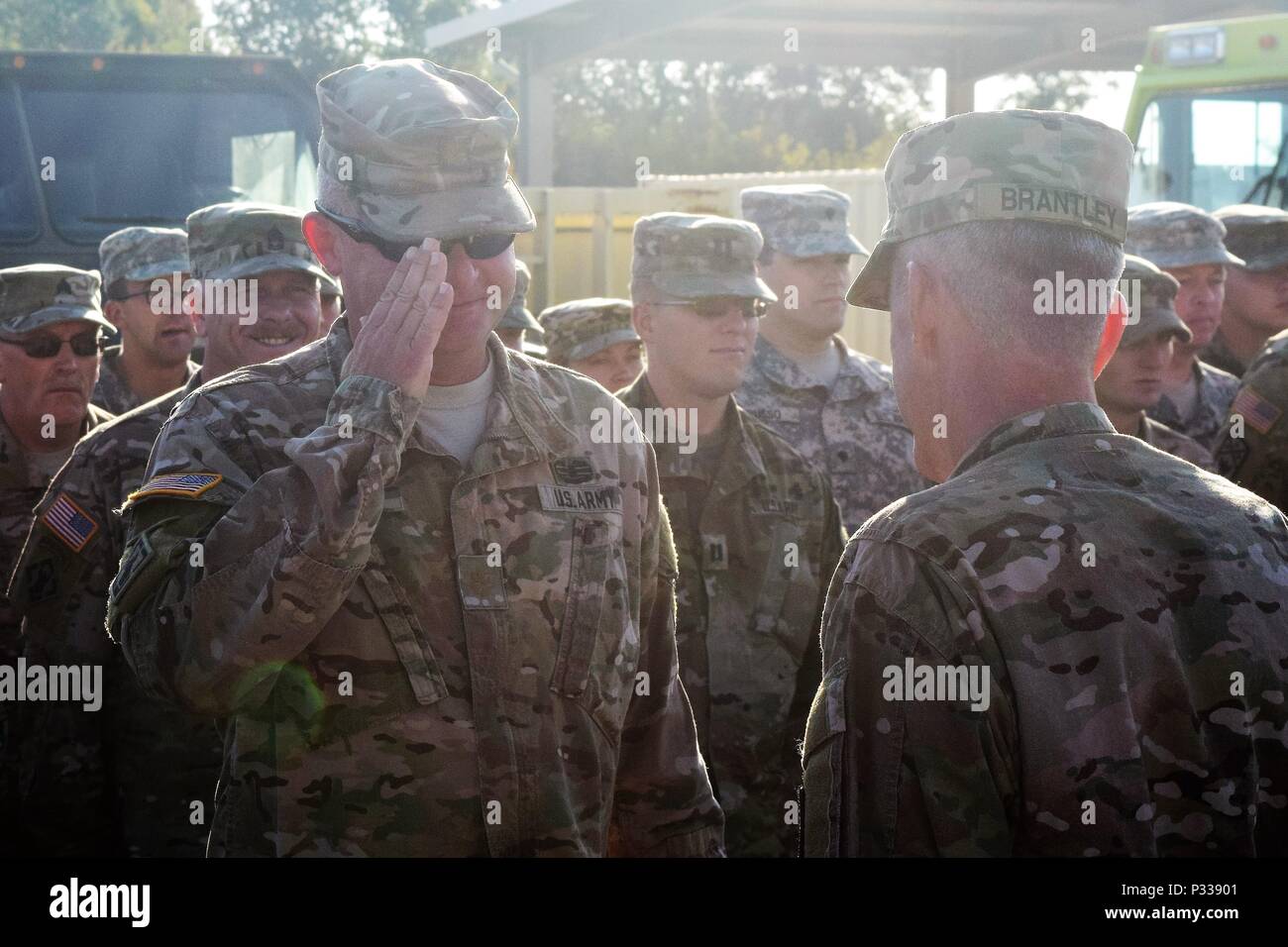 U.S. Army Maj. Stephen Love, left, a planning officer with the 253rd ...