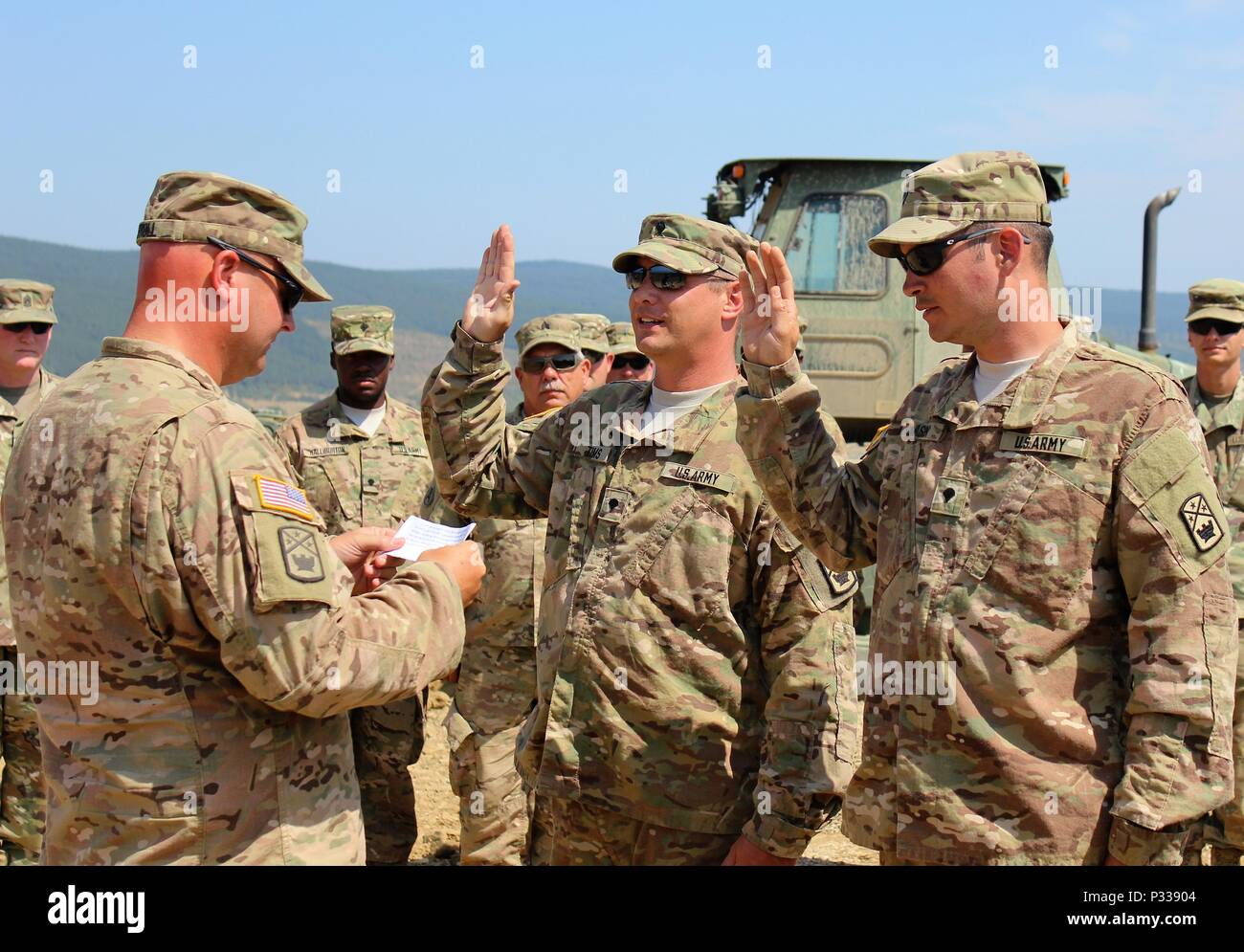 U.S. Army Capt. Kevin Carroll (far left), Company Commander for the ...