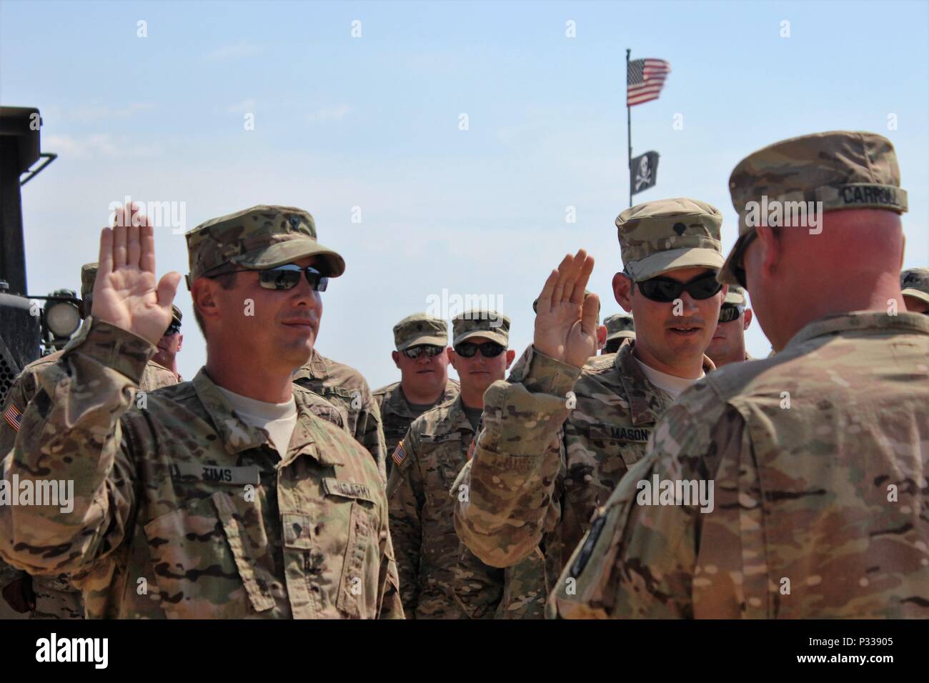 U.S. Army Spc. Bobby Tims (left) and Spc. Jake Mason (right), both with ...