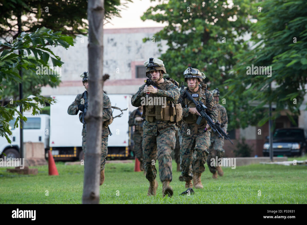 U.S. Marine Security Guard (MSG) watchstanders perform a drill outside ...