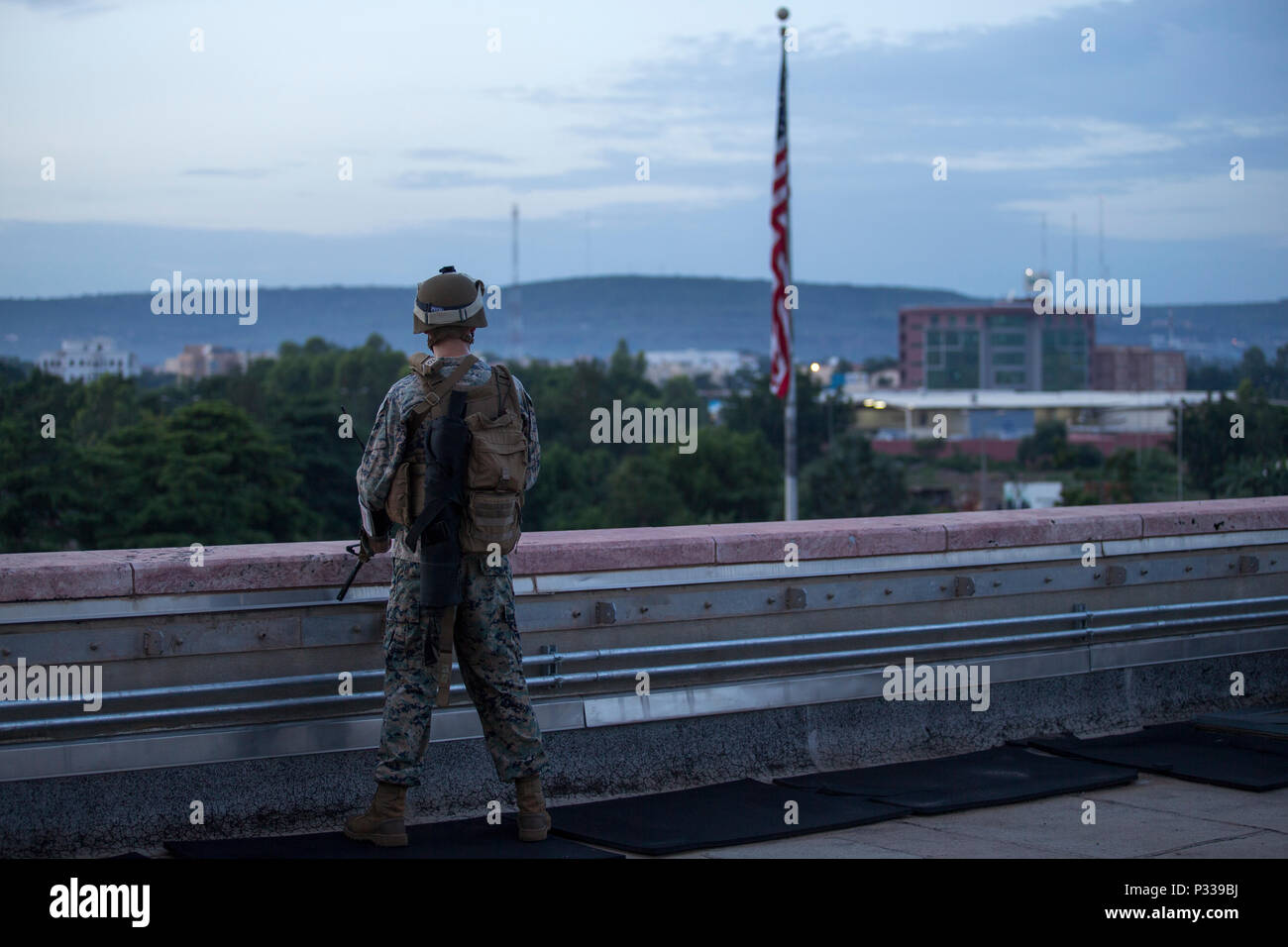 A U.S. Marine Security Guard (MSG) watchstander provides security while ...