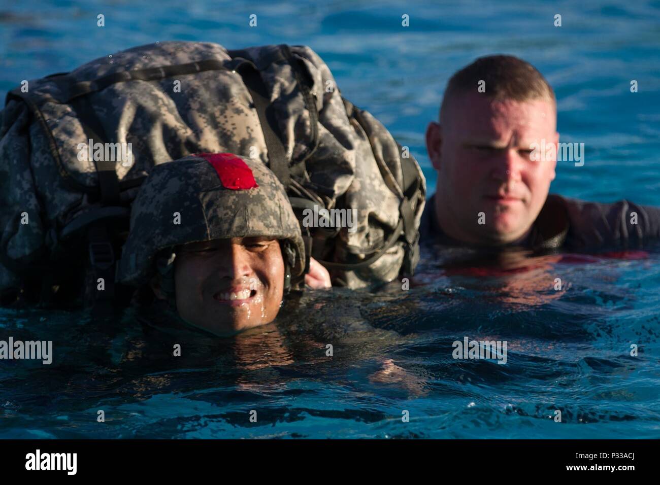 Arizona Army National Guard Capt. Jacques Viadoy struggles to swim ...