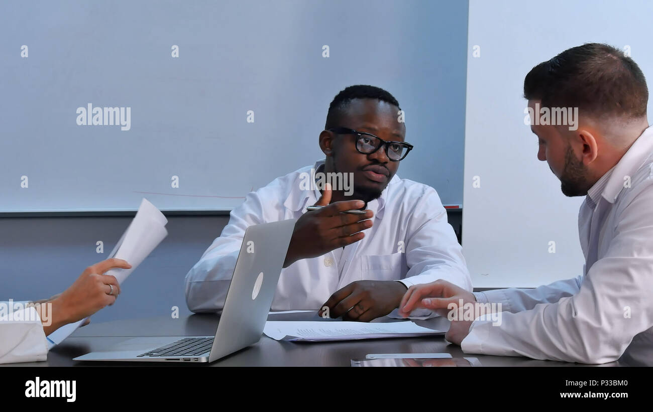 Medical staff chatting in office hi-res stock photography and images ...