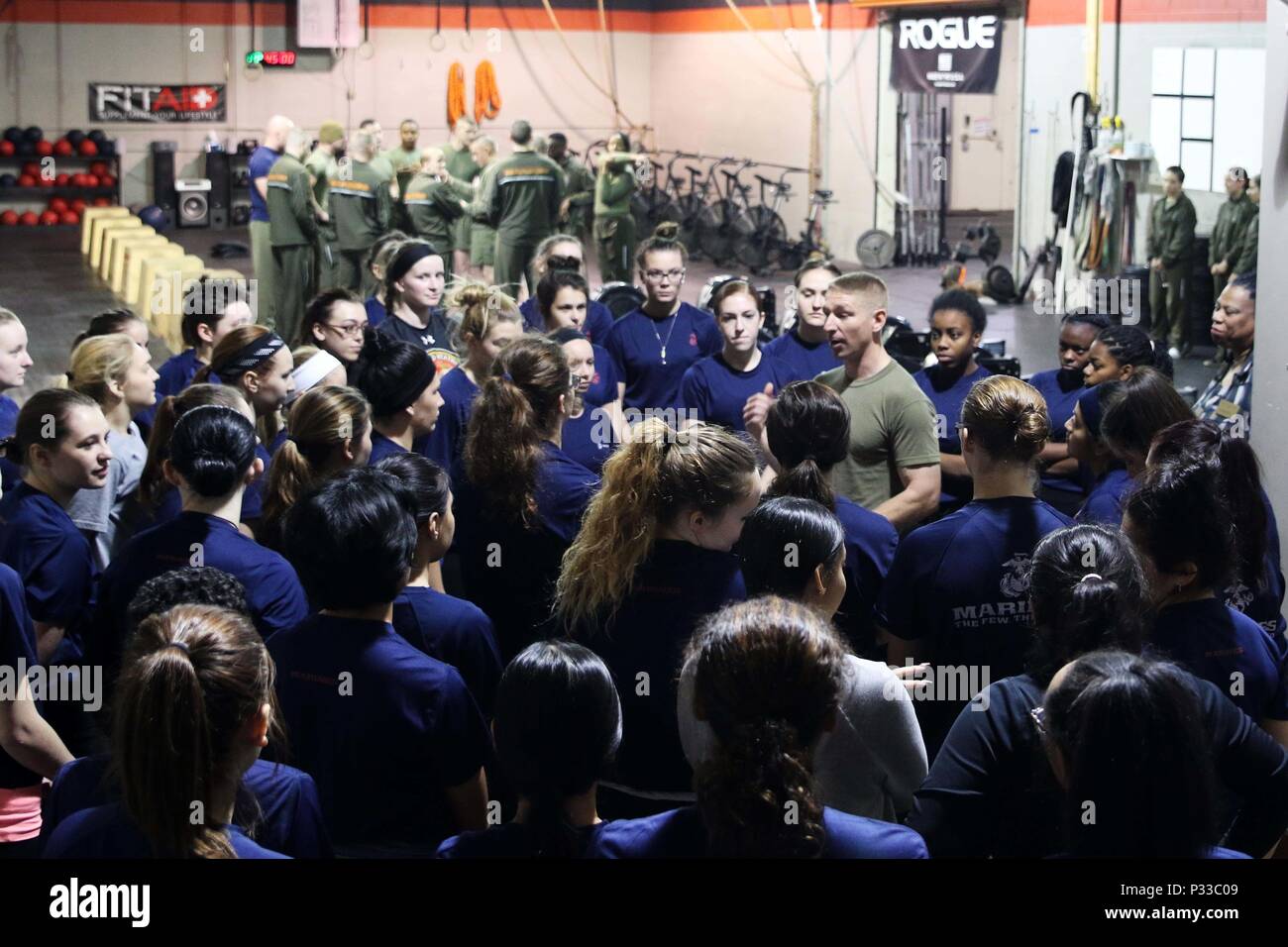 U.S. Marine Corps Maj. Andrew E. Terrell addresses the poolees of ...