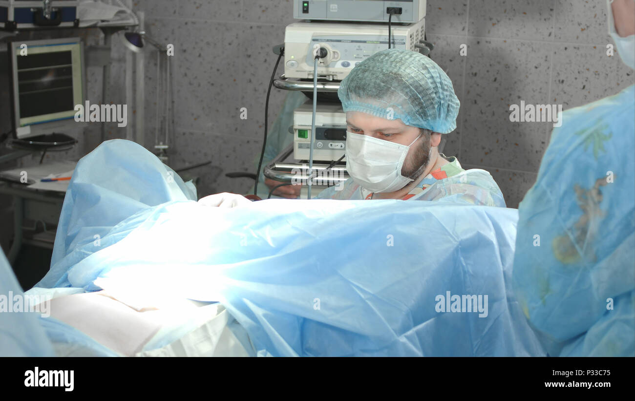 Medical team performing operation in hospital Stock Photo - Alamy