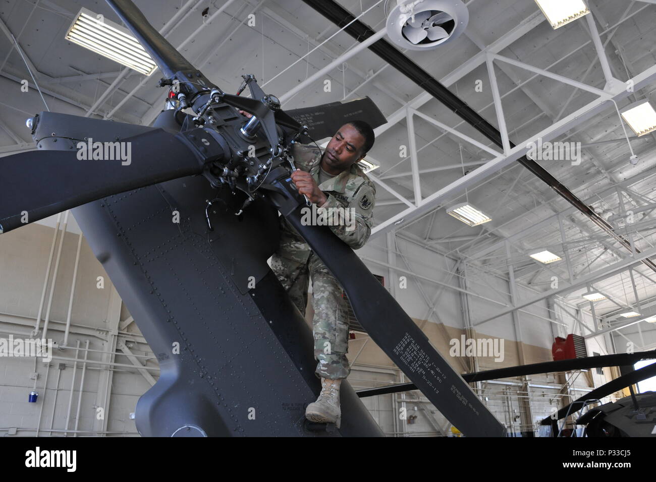 Members of the Army Reserve Aviation Command conduct maintenance and ...