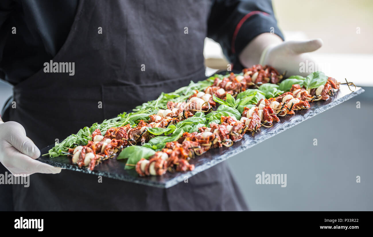 Man holding slate plate hi-res stock photography and images - Alamy