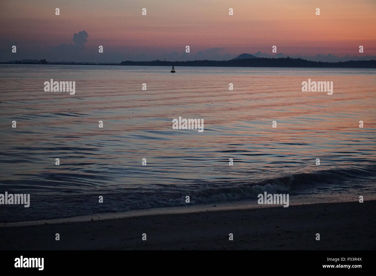 Beautiful colors of sea during sunrise hi-res stock photography and ...
