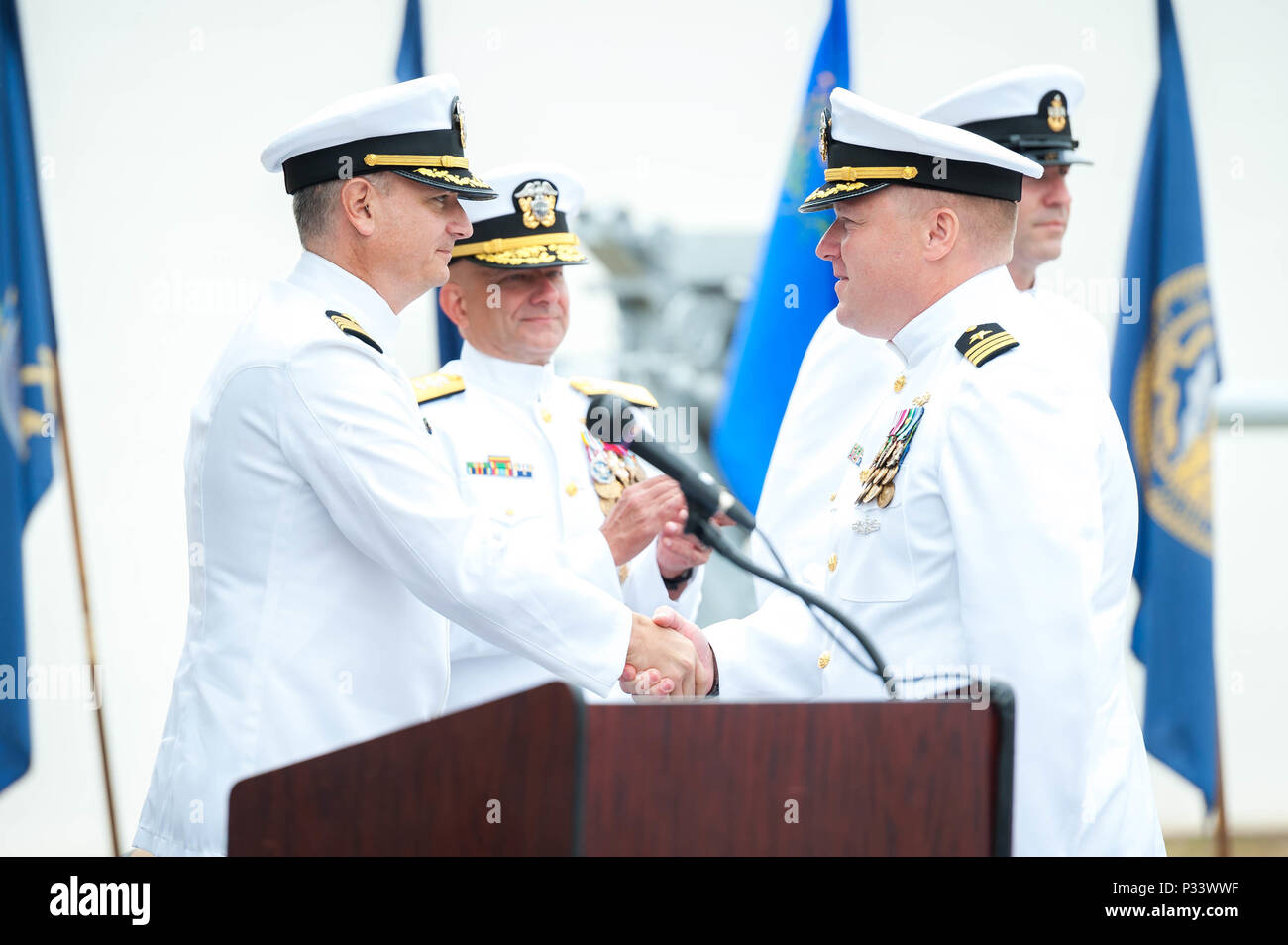 160826-N-XX082-003 SAN DIEGO (Aug. 26, 2016) Capt. Bill Lintz, left ...