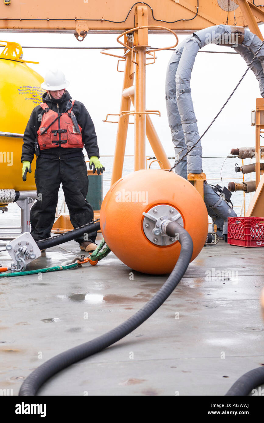 Petty Officer 2nd Class Julia Kinney, supervises the deployment of a ...
