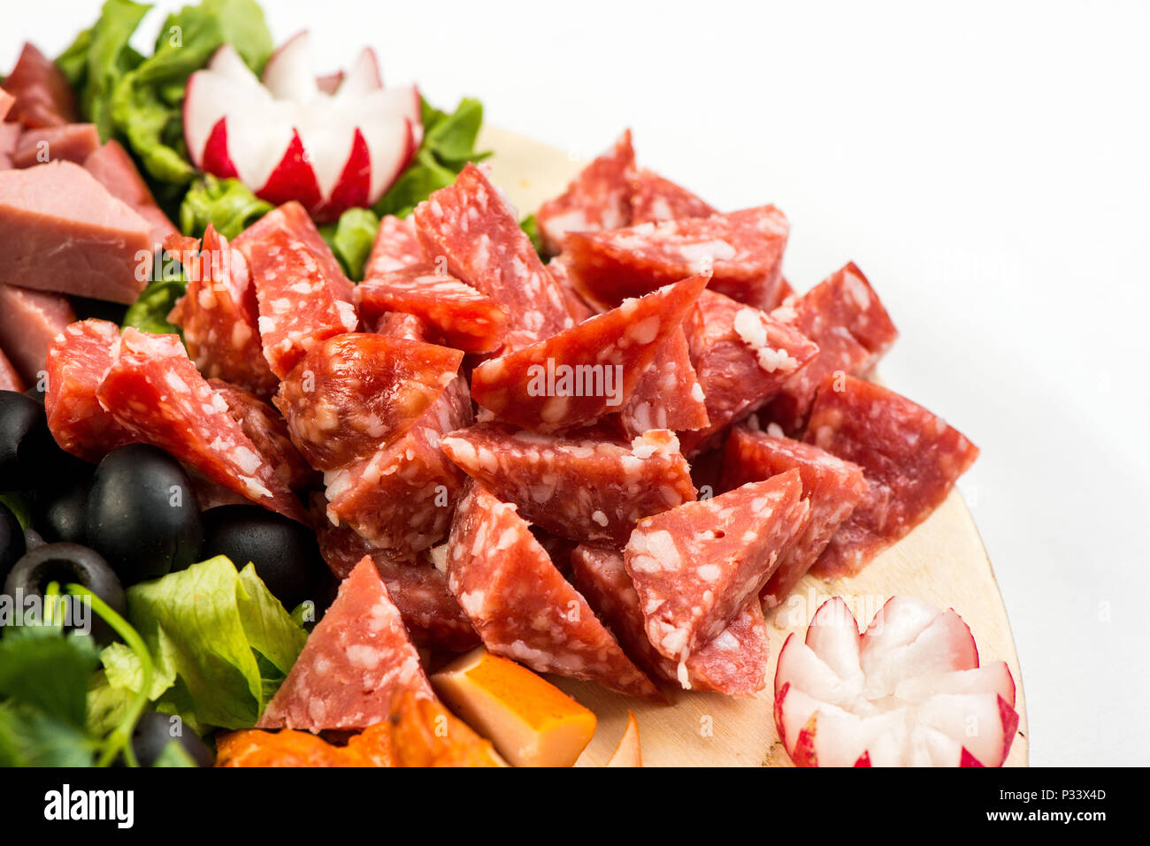 plate Board with meat and cheese. The Banquet in the Italian style ...